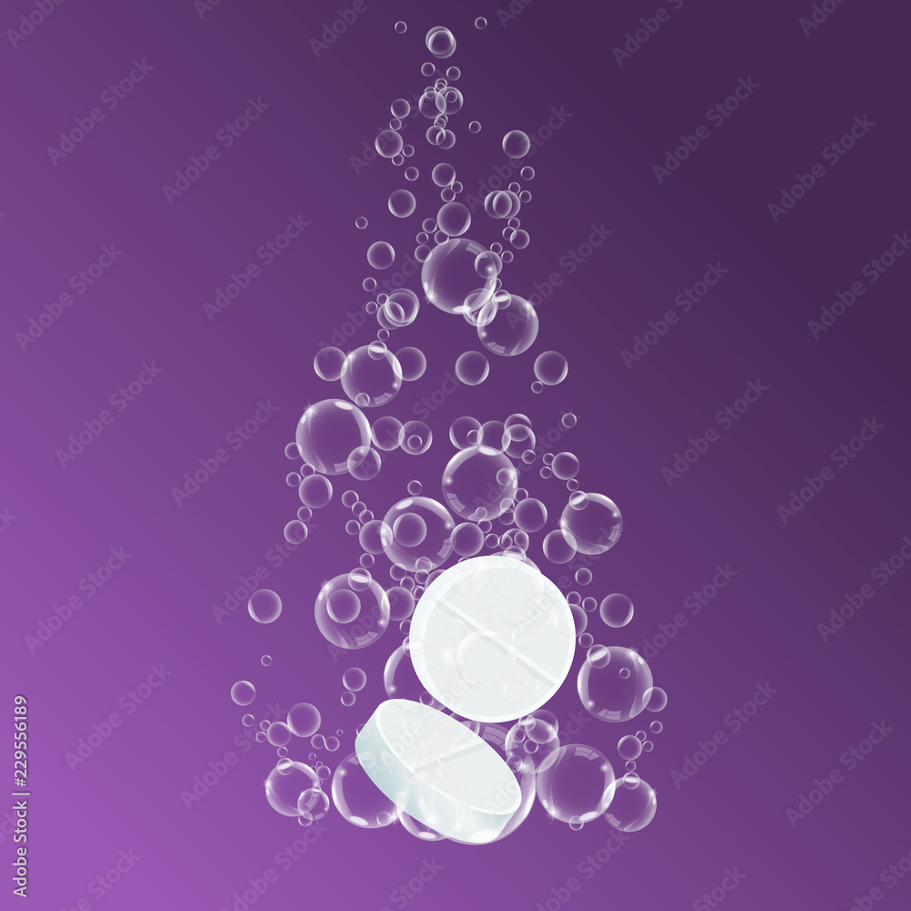 Round shaped two dissolving medicine pills. Sparkling water bubbles ...