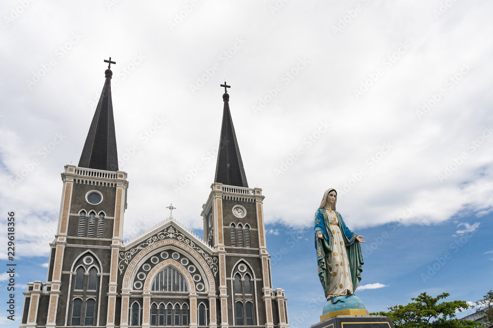 The Blessed Virgin Mary,mother of Jesus on the blue sky, in front of ...
