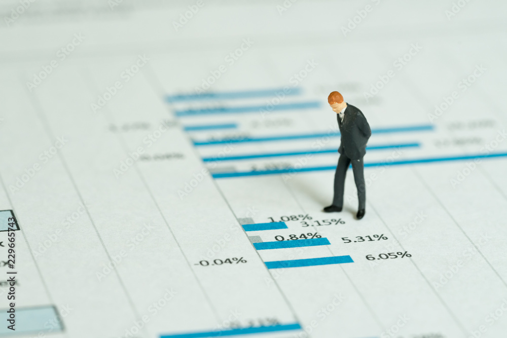 Investment, financial performance report analysis concept, miniature ...