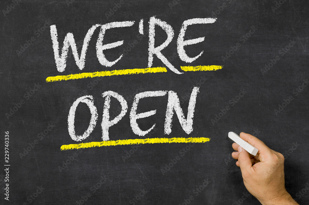 We are open written on a blackboard Stock Photo | Adobe Stock