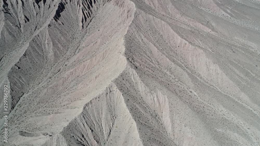 Senital drone scene of eroded sandy mountains. Top view with detail of ...