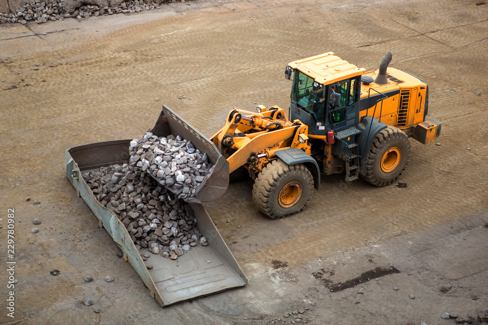 Loading cast iron ingots on ship bulk. Loading metal on ship ...