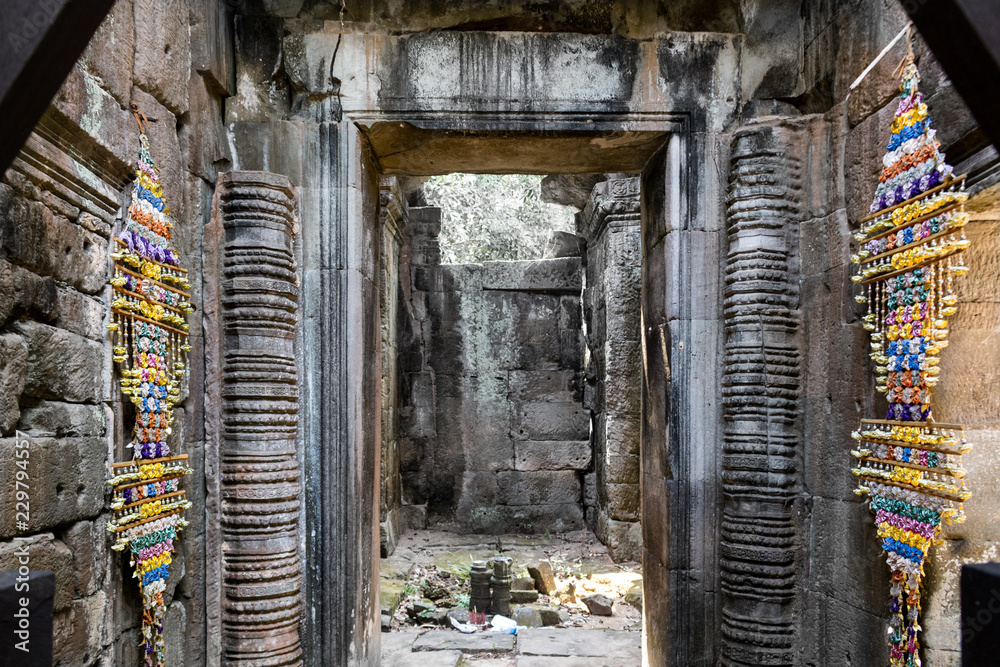 Inside ancient Khmer temple of Prasat Krol Ko in Angkor Wat complex at ...