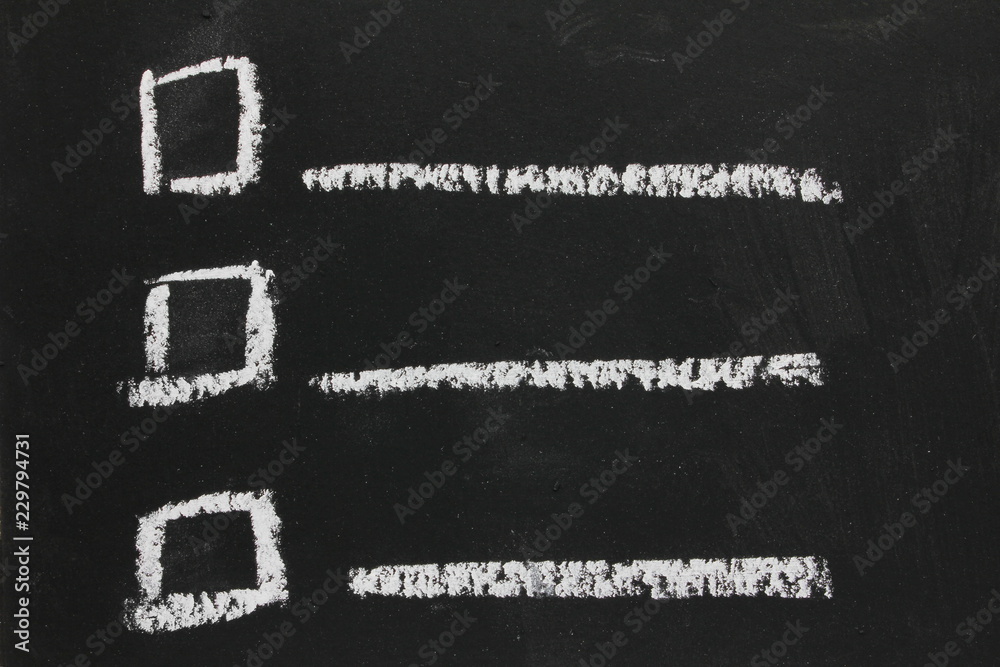 Chalkboard background of checklist in white chalk Stock Photo | Adobe Stock