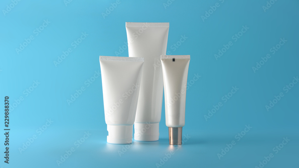 Set of cosmetic products on a color background. Cosmetic package ...