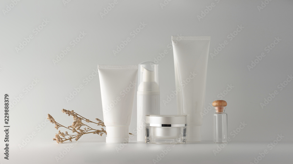Set of cosmetic products on a color background. Cosmetic package ...