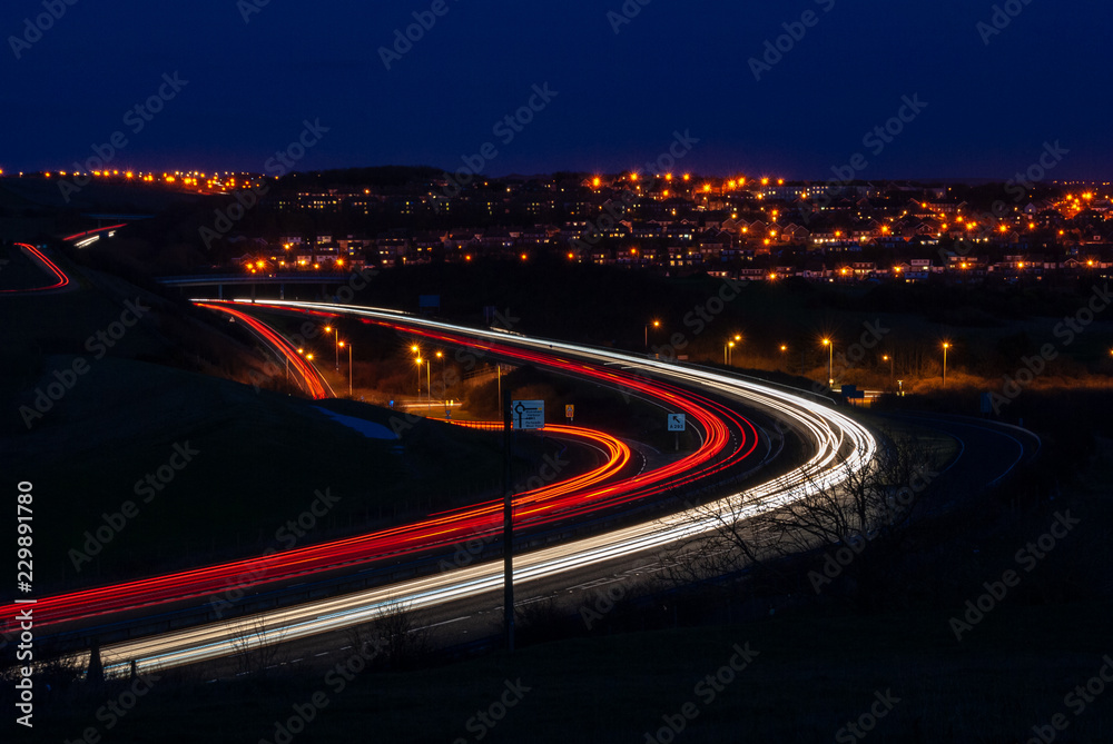 Light trails on the A27 north of Hangleton, Hove. The junction with the ...