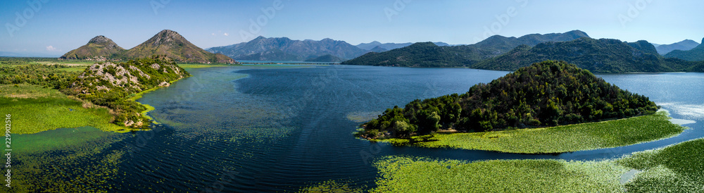 Aerial panoramic view of the beautiful landscape of Lake Skadar in the ...