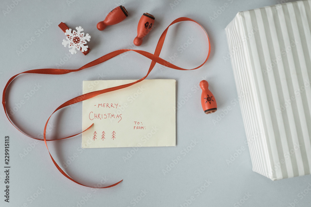 Writing Christmas cards and wrapping Christmas presents Stock Photo ...