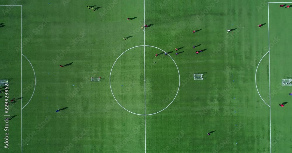 Football Soccer Team Training On A Soccer Field 4K Aerial Footage Stock ...