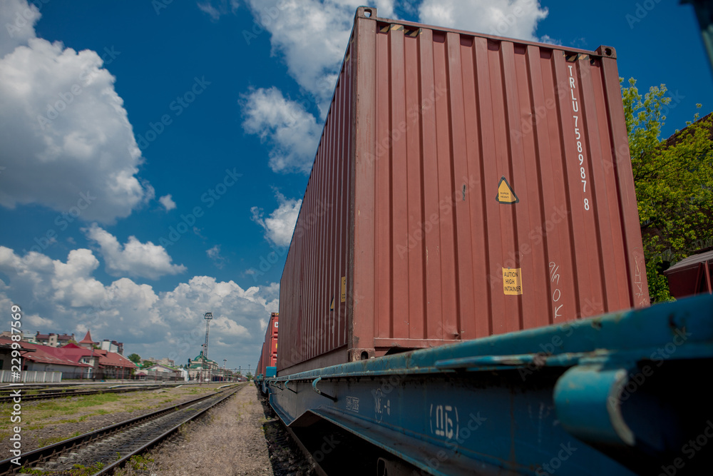 Container loaded on train wagons on a railway Stock Photo | Adobe Stock