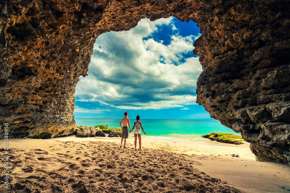 Bali seascape with huge waves at beautiful hidden white sand beach ...