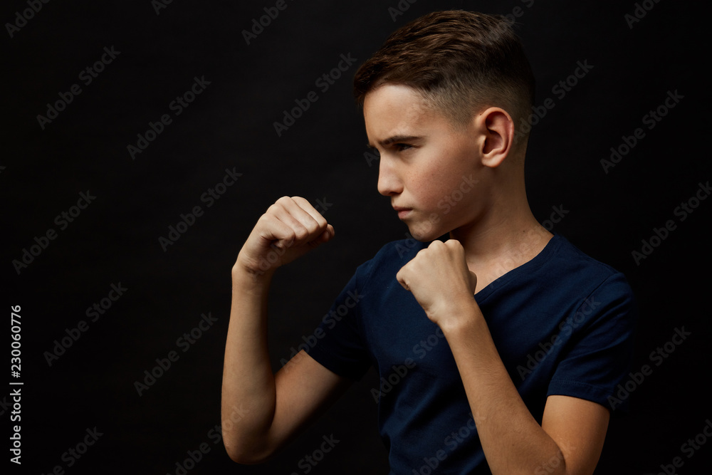 profile of Young boy boxer pose of protection. Look aside Stock Photo ...