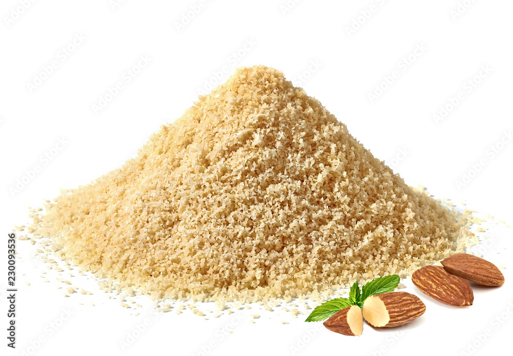 Almond flour pile or grated almonds side view isolated on white ...