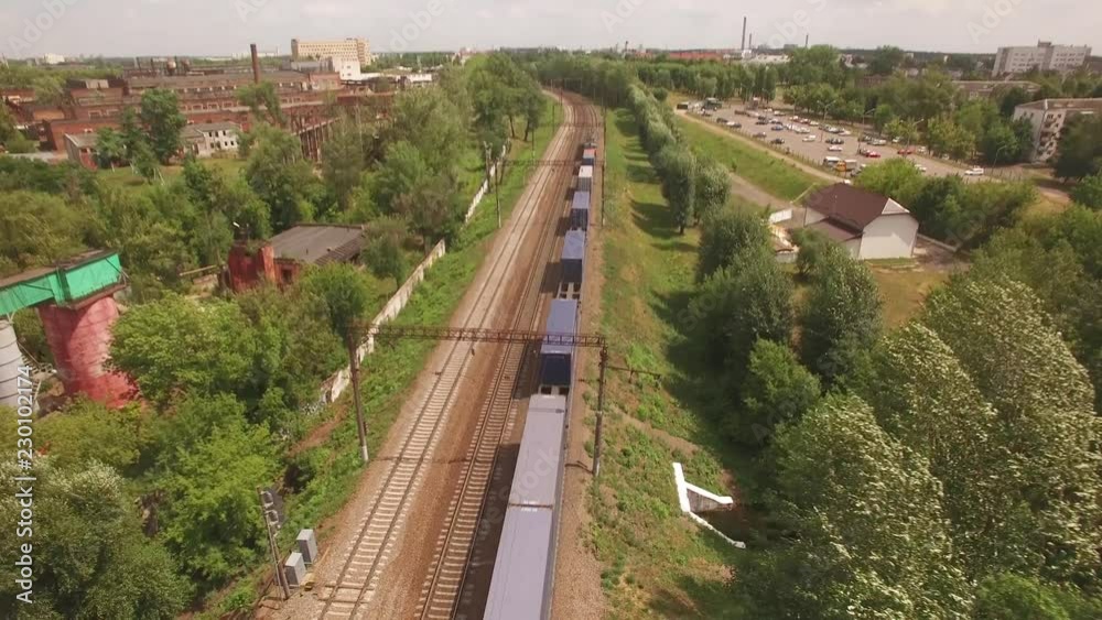 Video Stock Electric freight train, locomotive moves rides by rail with ...
