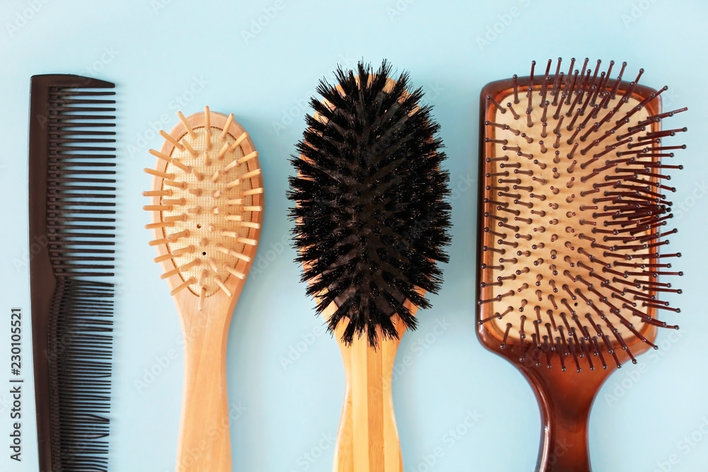 Hairdressing brush set hair of various types with blue background ...