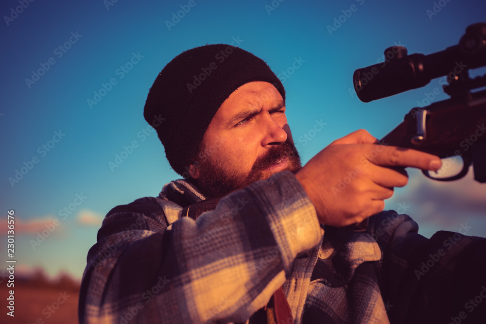 Hunting is the practice of killing or trapping animals. Hunter with ...