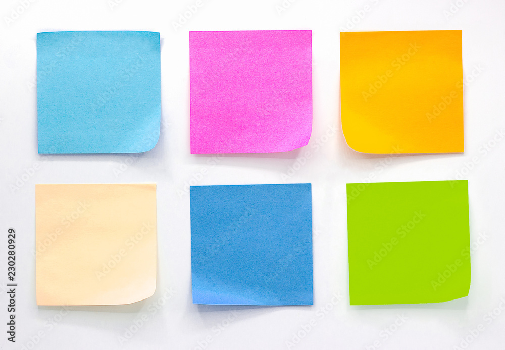 Collection of different colored sheets of note papers Isolated on white ...