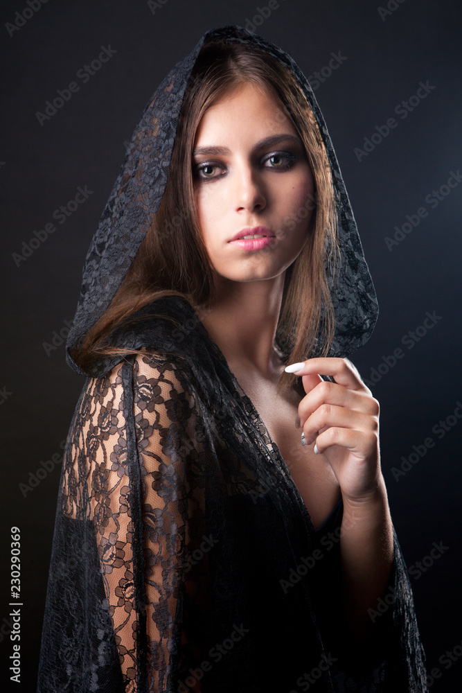 Vintage style portrait of young beautiful witch woman with gothic ...