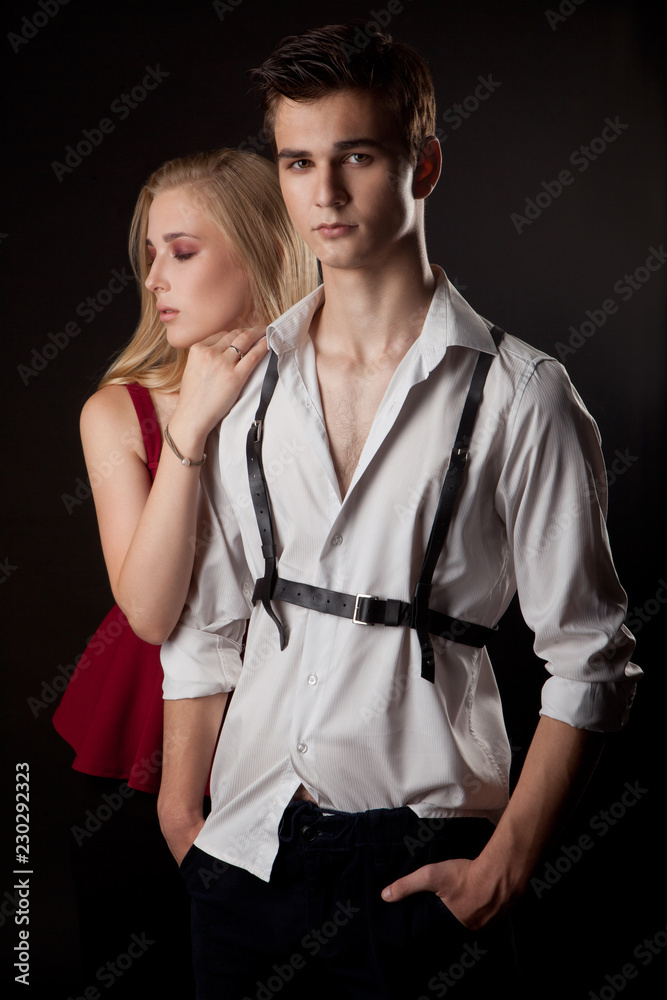 Beautiful gangster couple in love on black background Stock Photo ...
