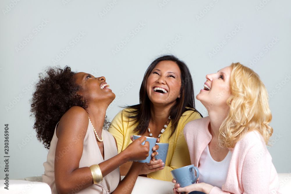 Diverse group of women talking and drinking coffee. Stock Photo | Adobe ...