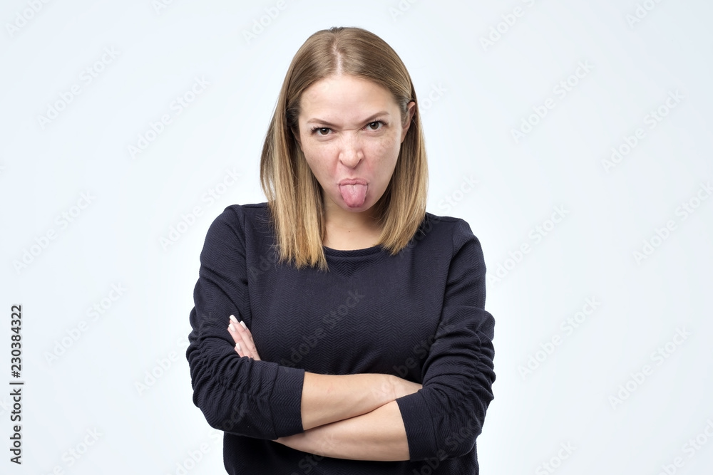 Dissatisfied Female Model Frowns Face Has Disgusting Expression Shows