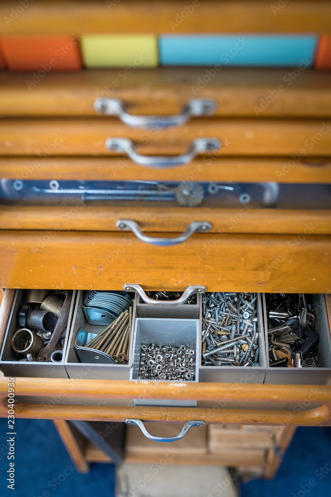 screw, drawer, tool cabinet. Tool cabinet with open drawer. There are ...