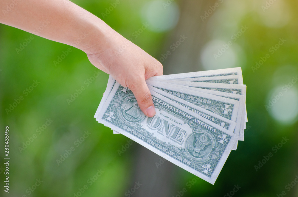 Hand send money dollar banknote natural background money saving and ...