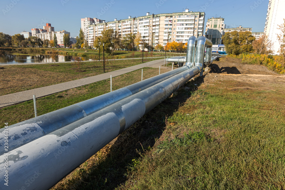 Modern Elevated Heat Pipes. Pipeline above ground, conducting heat to ...