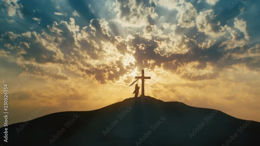 Silhouette of a Woman praying at Holy Cross. Jesus Christ crucifixion ...