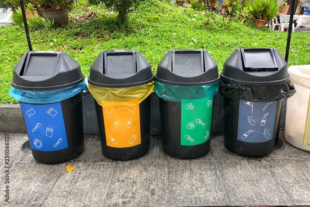 Difference Colored Bins For Collection Of Recycle Materials Stock Photo ...