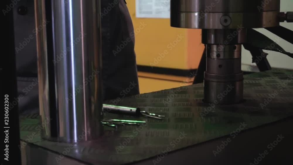 Metal sample is tested for compressive strength. Footage. Close-up of ...