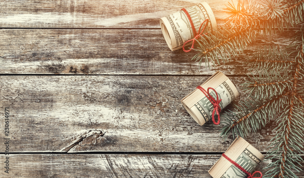 Xmas background of old wood. Christmas tree with American money. Light ...