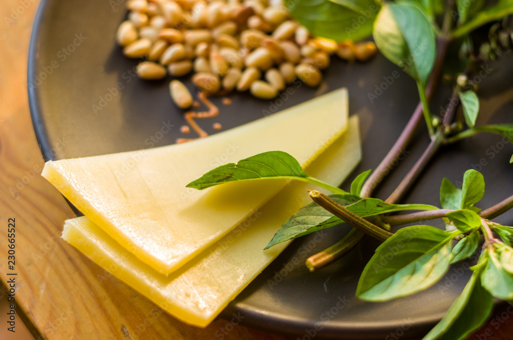 Fresh ingredients for preparing Italian pesto sauce - lemon basil ...