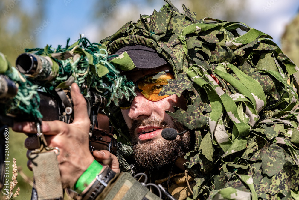 special forces, soldier assault rifle with silencer, optical sight ...