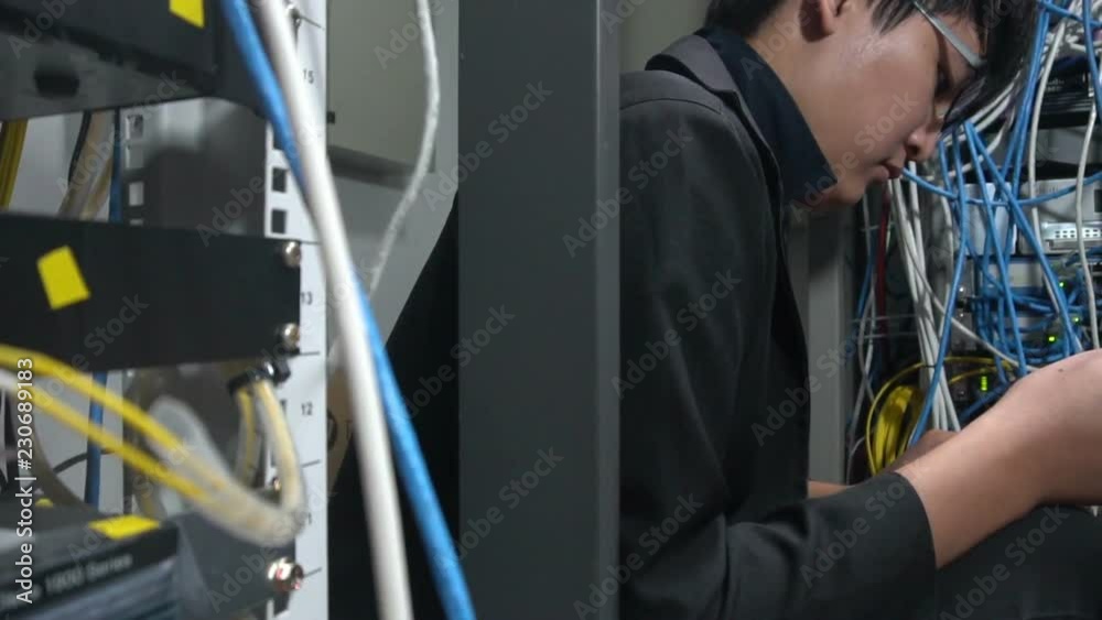 Engineer with toolboxs come to server room for work,check problem of ...