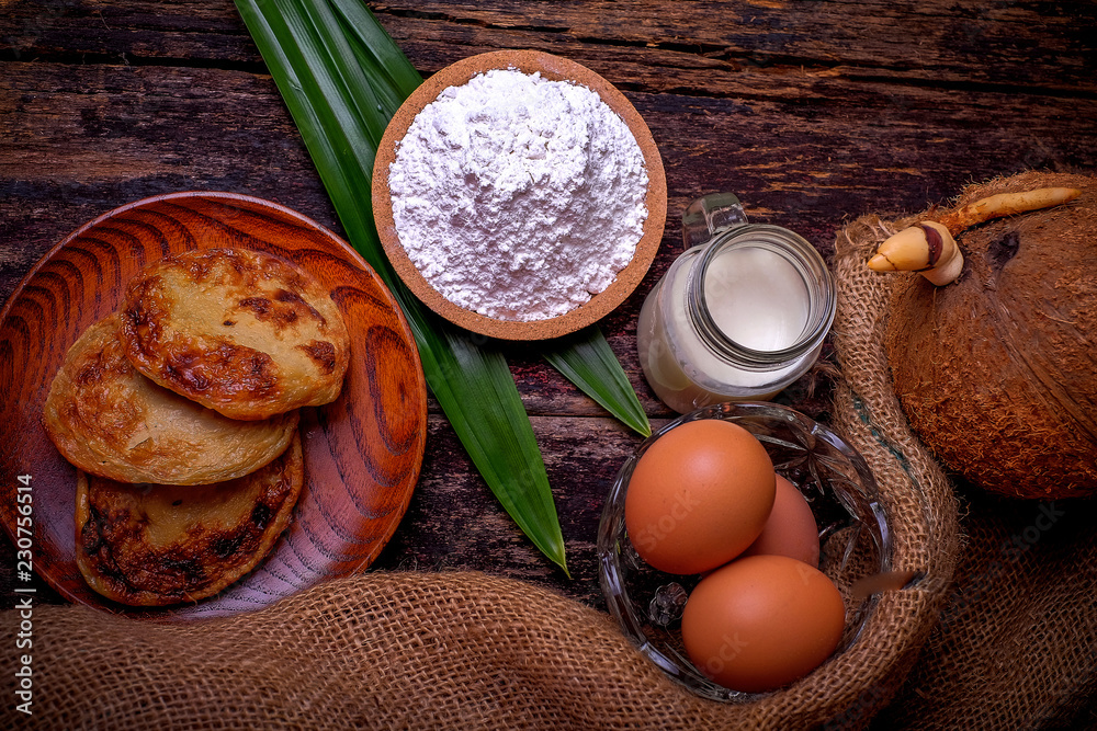 Akok Kedut, egg, coconut, flour , coconut milk and Pandan leaf on ...