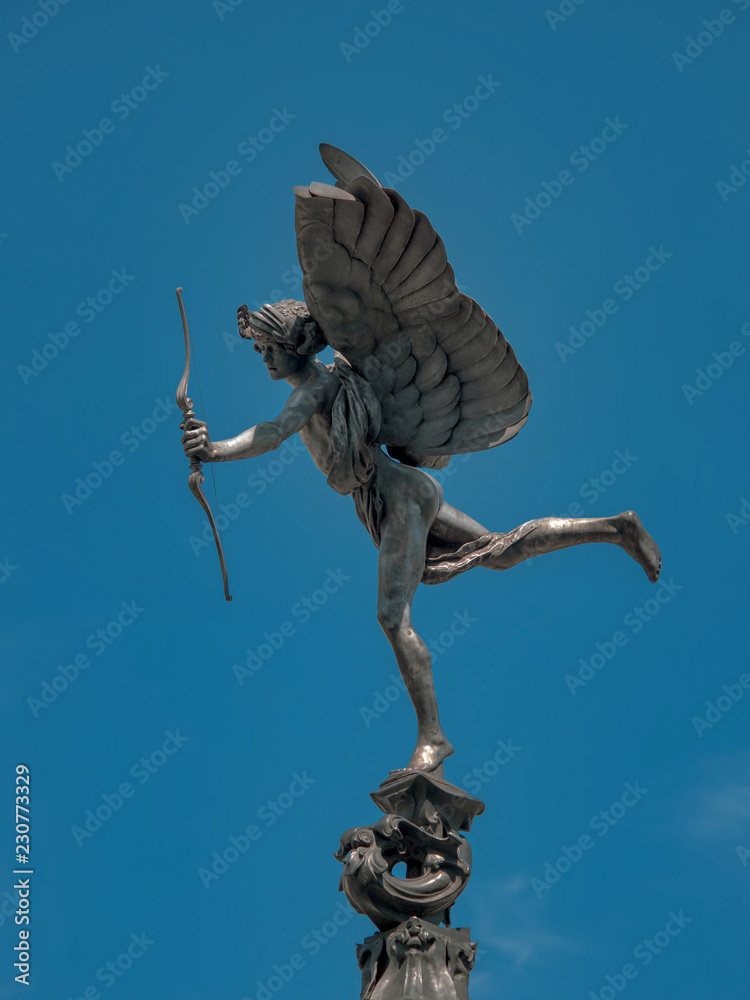 Eros statue on top of the Shaftesbury Memorial Fountain in Piccadilly ...