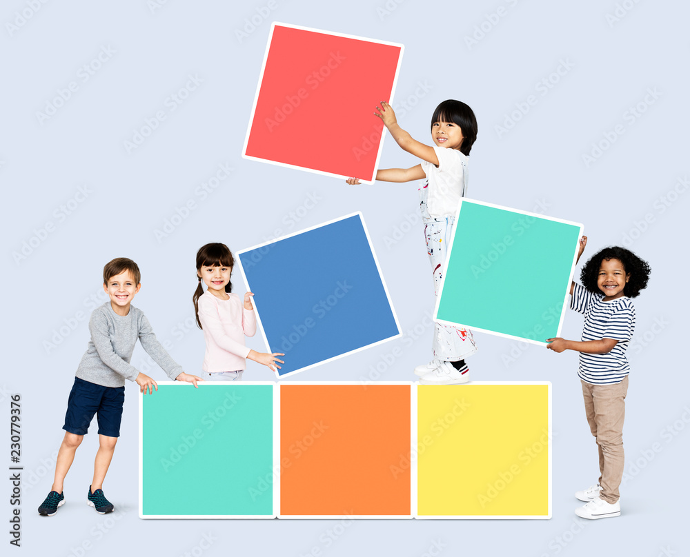 Happy children building blocks Stock Photo | Adobe Stock
