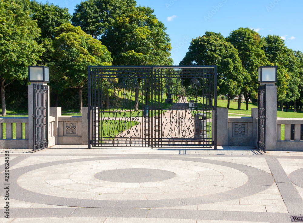 Oslo, Norway, Forged gates around the monolith in Vigeland Park. Along ...
