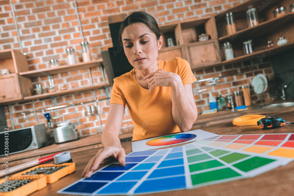 Color map. Pretty female person looking forward and taking color ...