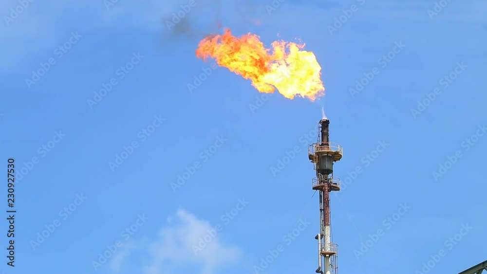 Fire on flare stack at oil and gas central processing platform release ...