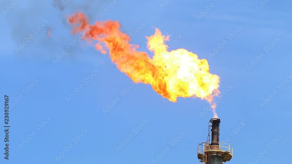 Fire on flare stack at oil and gas central processing platform release ...