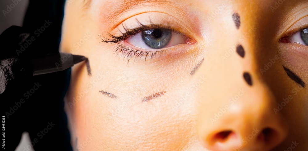 Peaceful young patient with dotted lines on the face Stock Photo ...