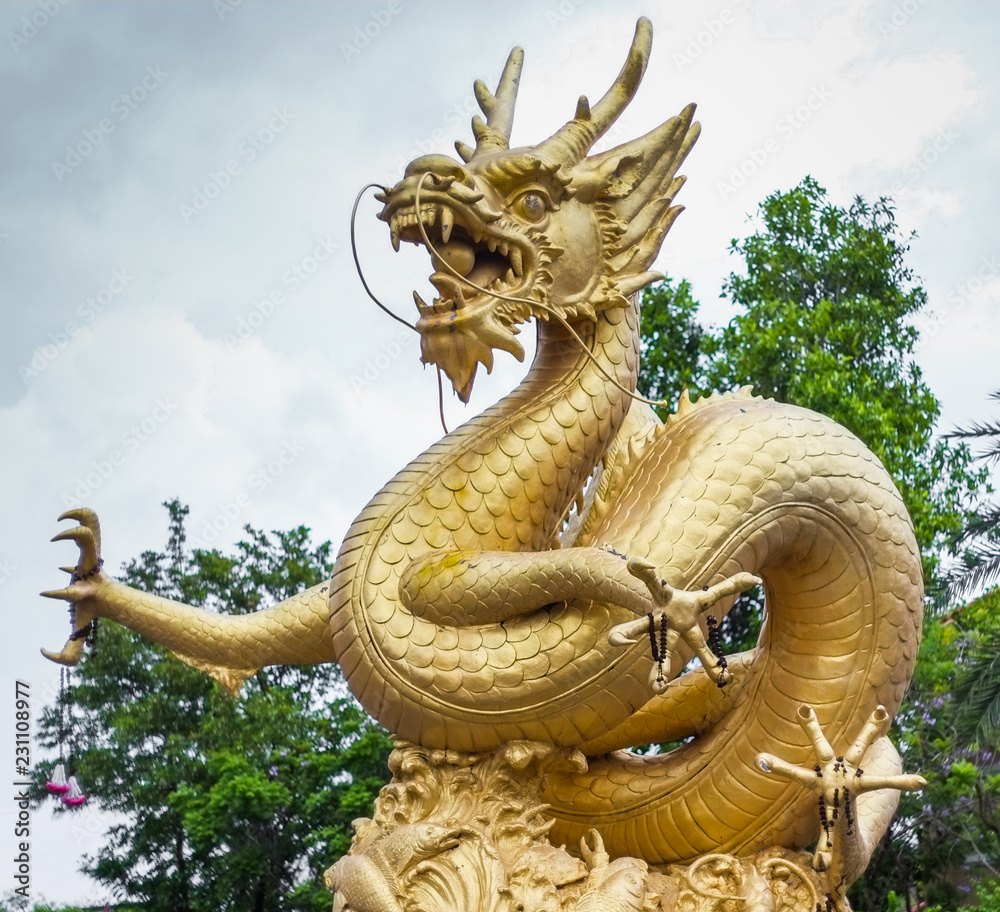 Beautiful statue of dragon in the garden. Stock Photo | Adobe Stock