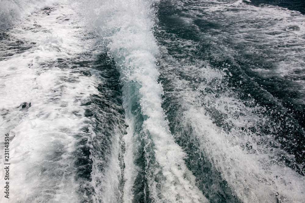 White foam on sea surface. Marine travel ship tail photo. Motor boat ...
