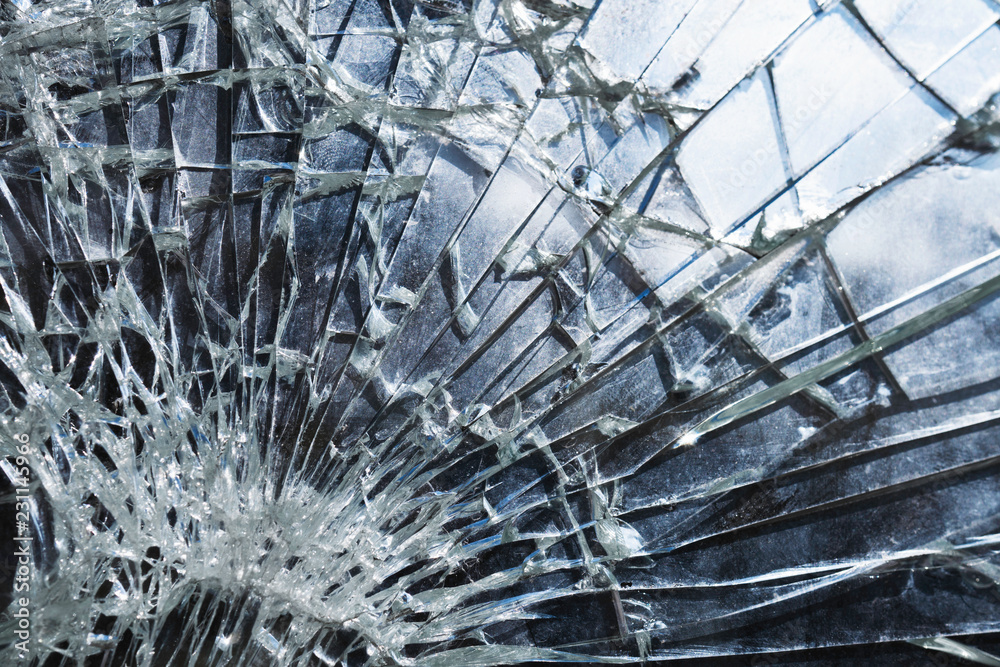 Criminal incident at the bus stop. Shooting a pistol. Hole and cracks ...