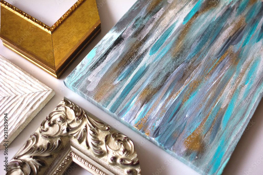 Picture framing. Choosing the frame for a painting. Stock Photo | Adobe ...