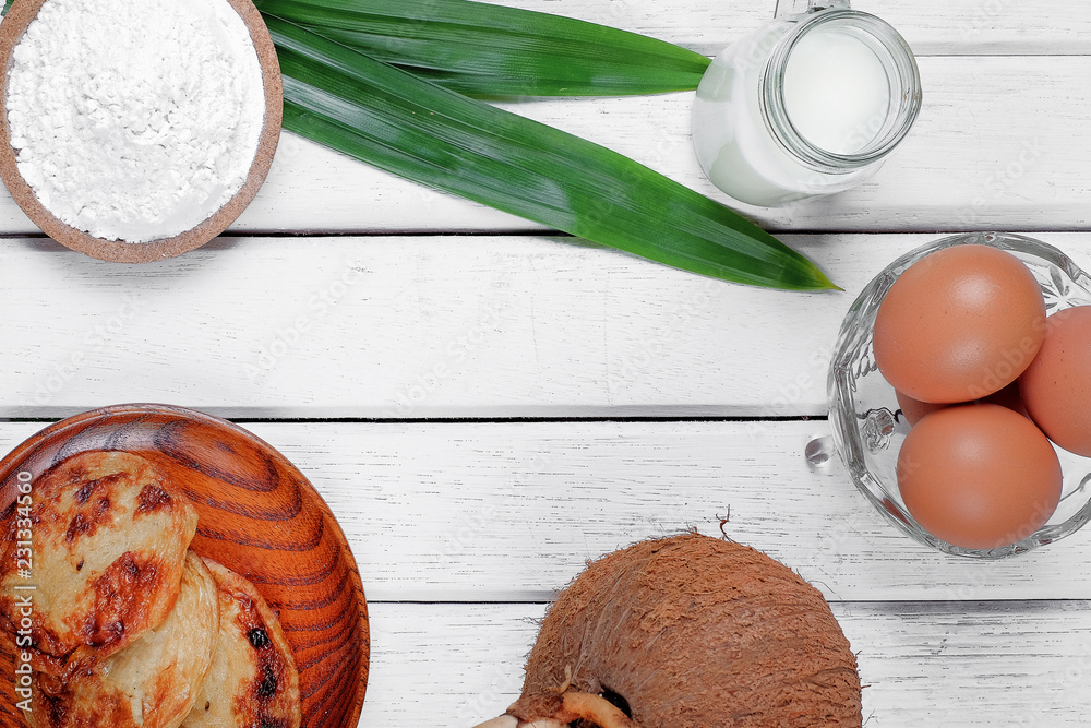 Akok Kedut, egg, coconut, flour , coconut milk and Pandan leaf on ...