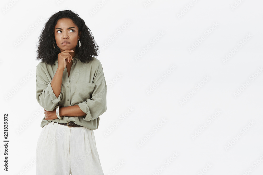 Woman thinking how get rid of troubles. Intense smart and thoughtful ...